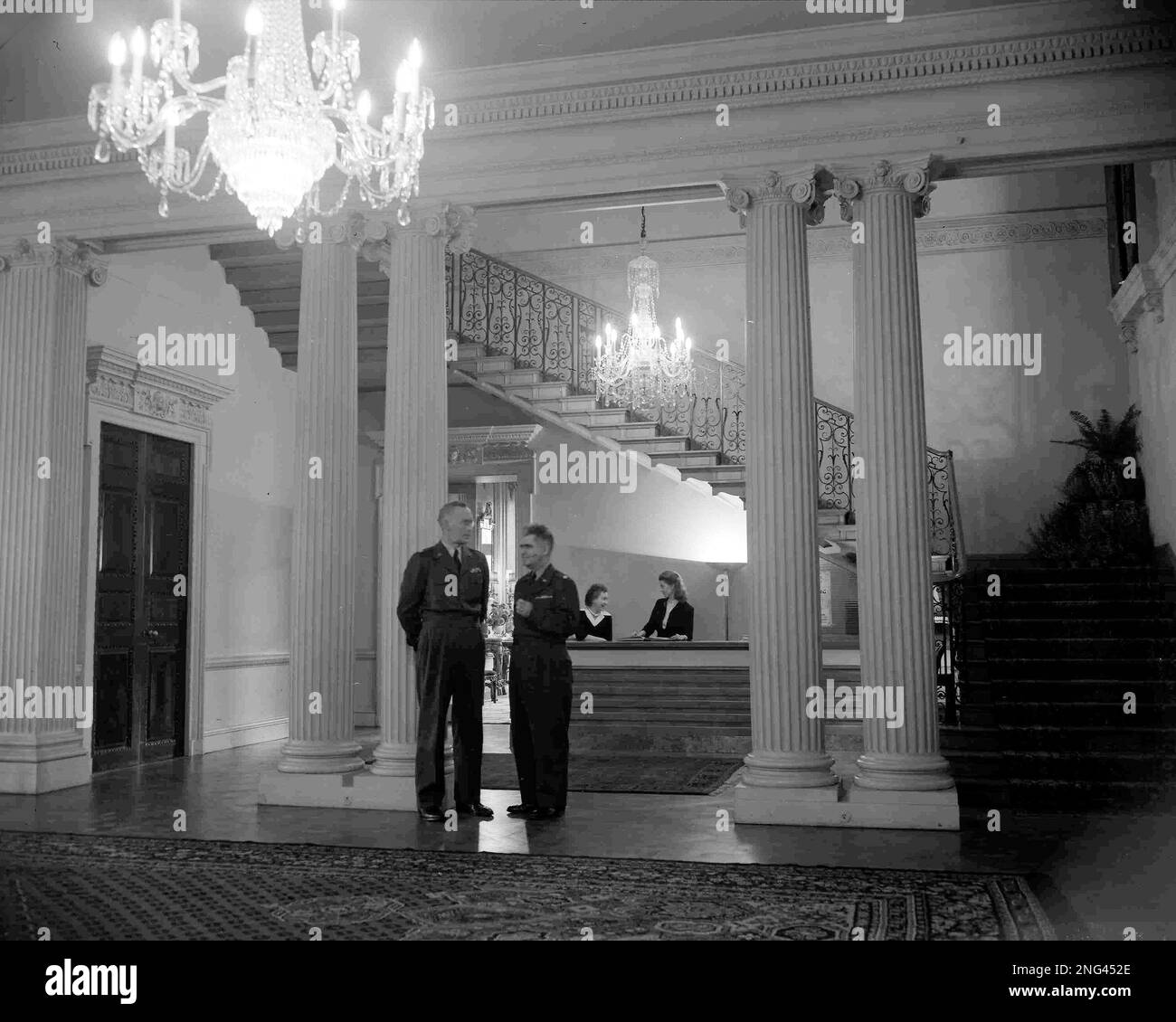 Officer in charge of the building Lieutenant Colonel H. McNamara, left ...