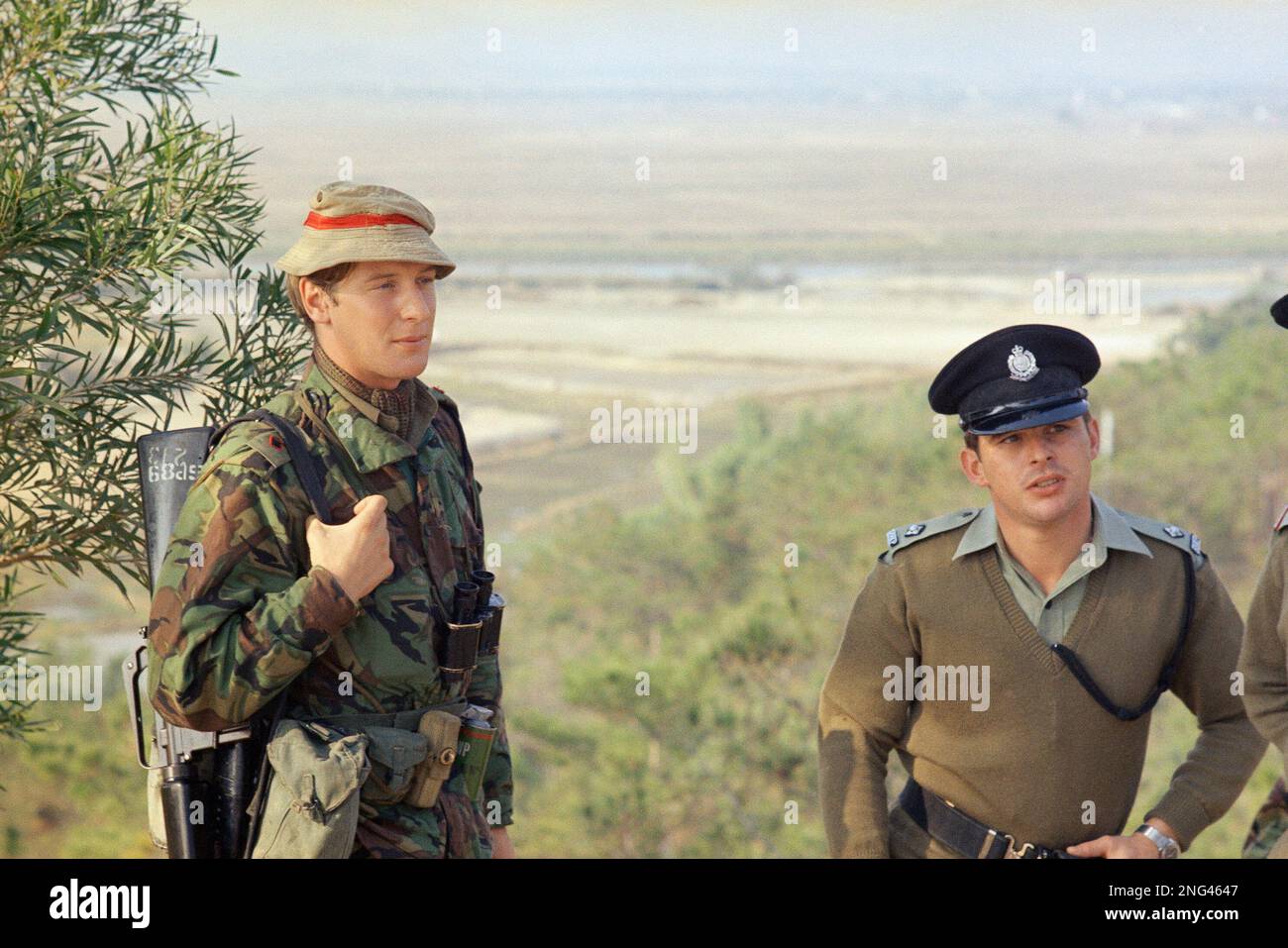 A British officer and British Police Inspector on joint patrol in Hong ...