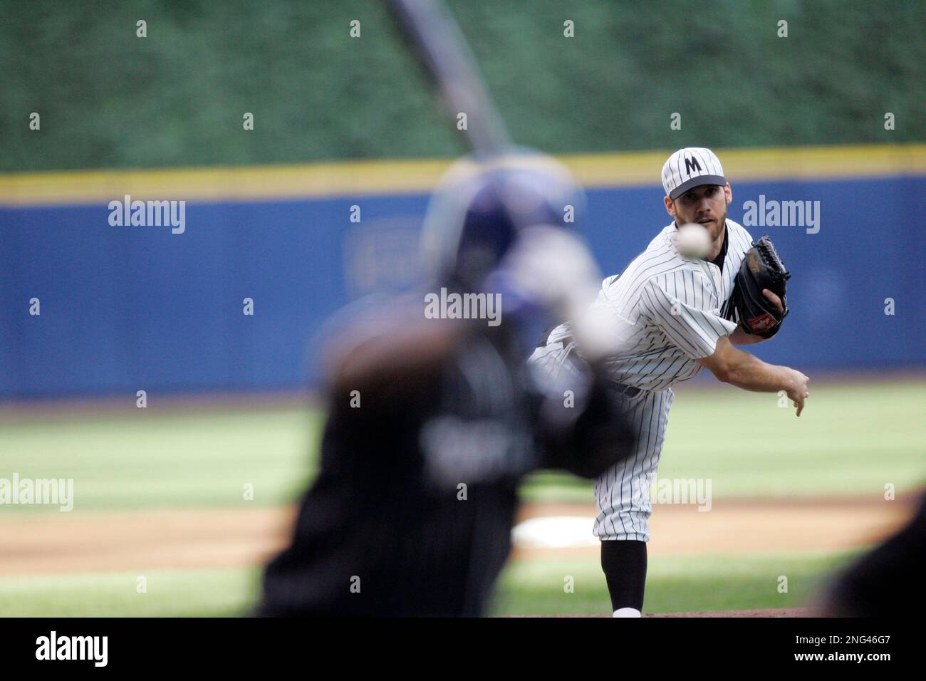 Milwaukee Brewers pitcher Dave Bush throws during the first inning of a ...