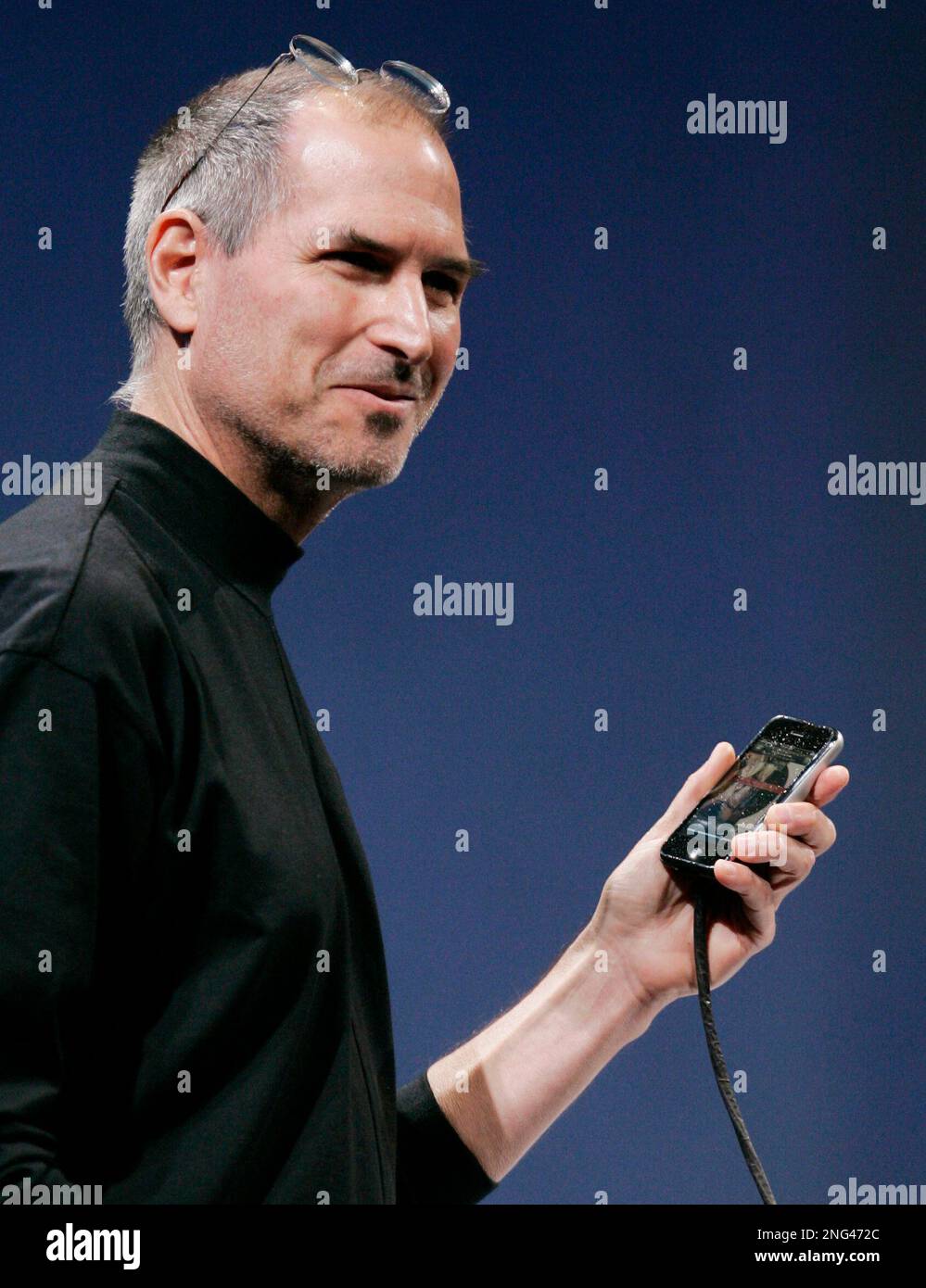 **FILE**Apple CEO Steve Jobs demonstrates the new iPhone during his ...