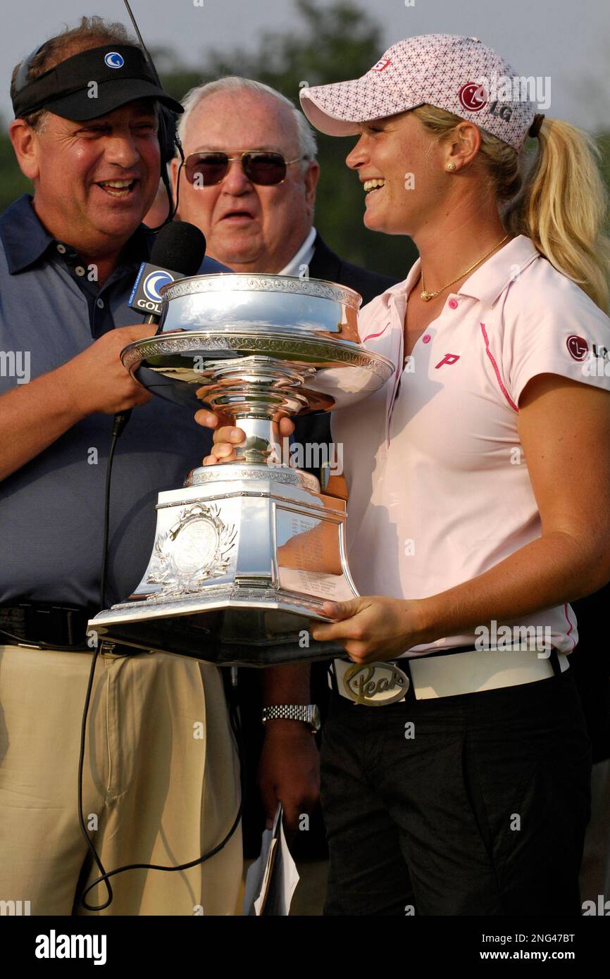 Suzann Pettersen, of Norway, receives her trophy after winning the LPGA ...