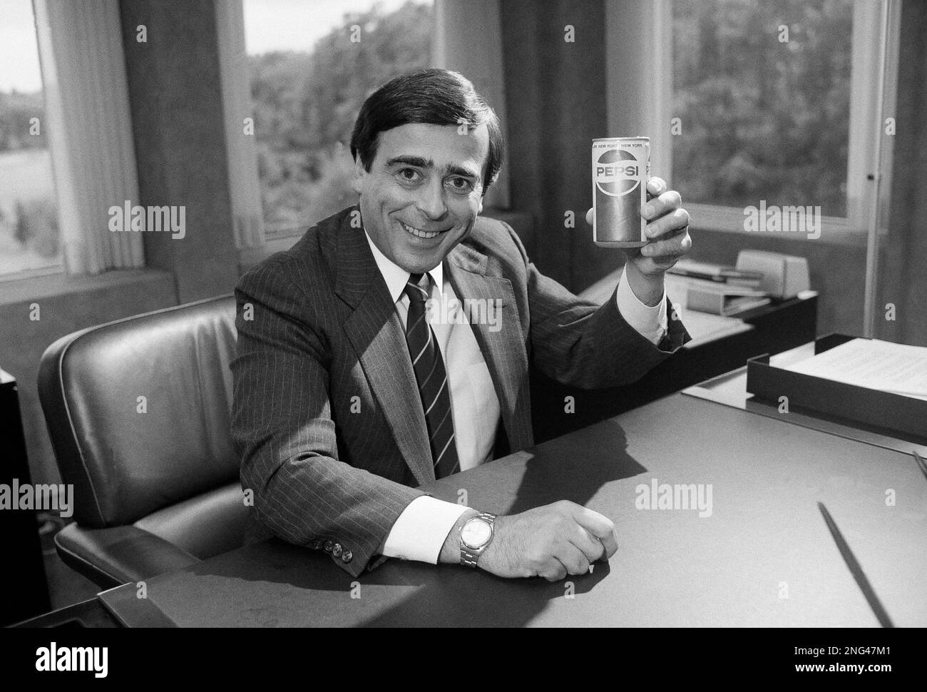 Roger Enrico, chairman of Pepsi USA, relaxes in his office in Purchase ...