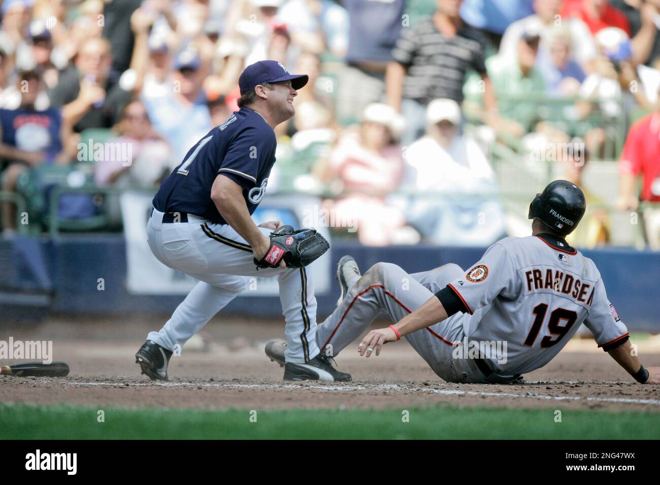 Milwaukee Brewers pitcher Brian Shouse tags out San Francisco Giants ...