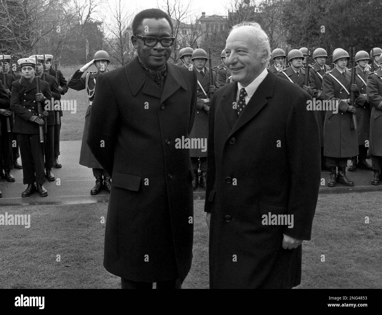 Zaire's President Joseph Desire Mobutu Sese Seko reviews the honour ...