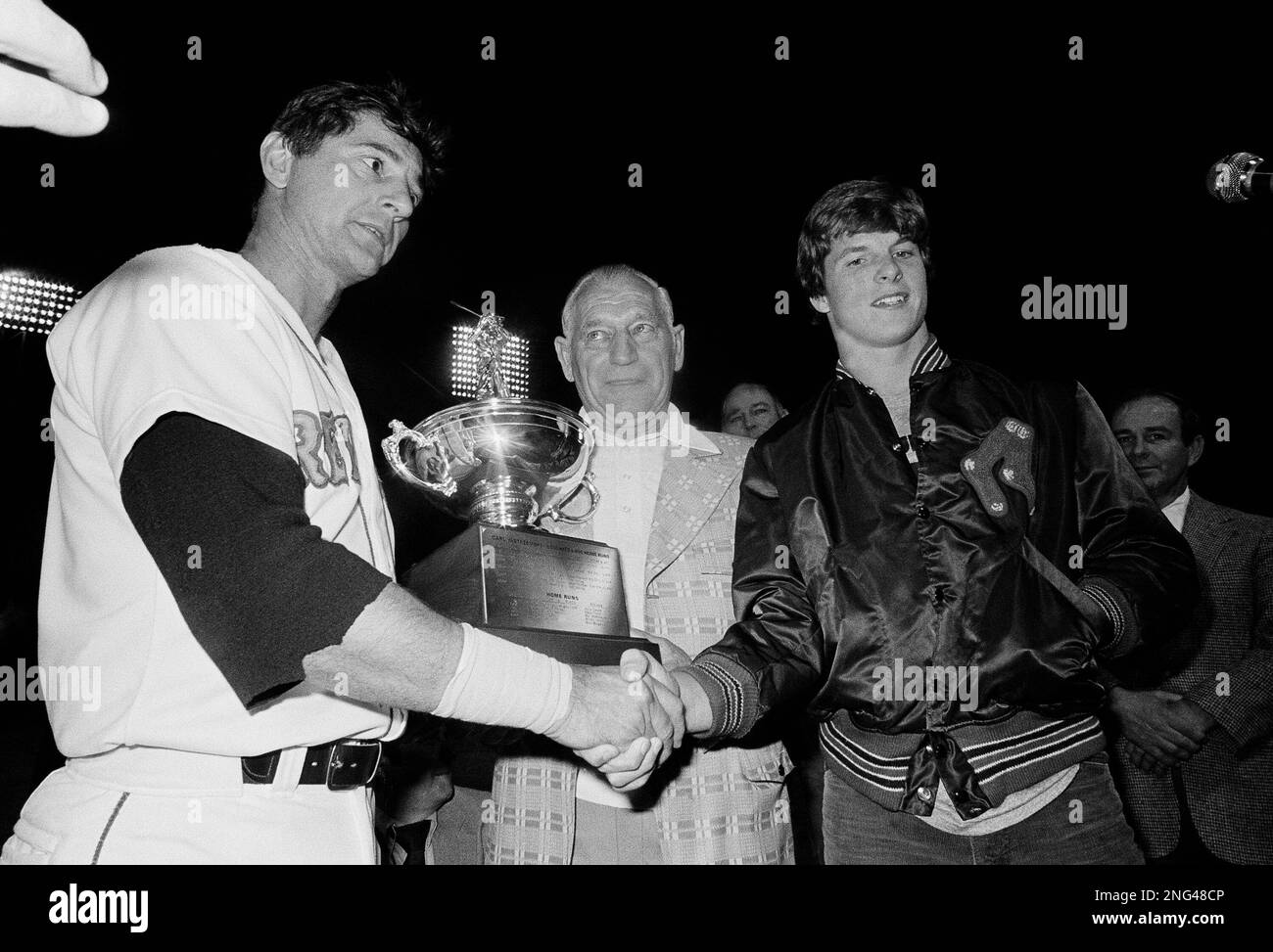 Boston Red Sox Carl Yastrzemski is joined by his father Carl Yastrzemski Sr., center, and his ...