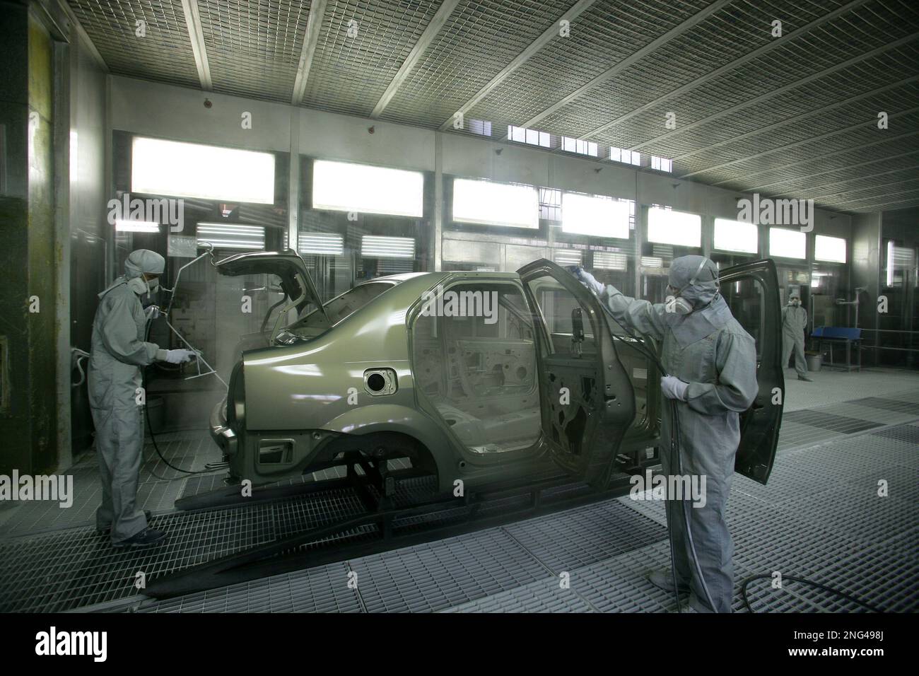 Moroccan workers in the painting room of the Renault Logan assembly ...