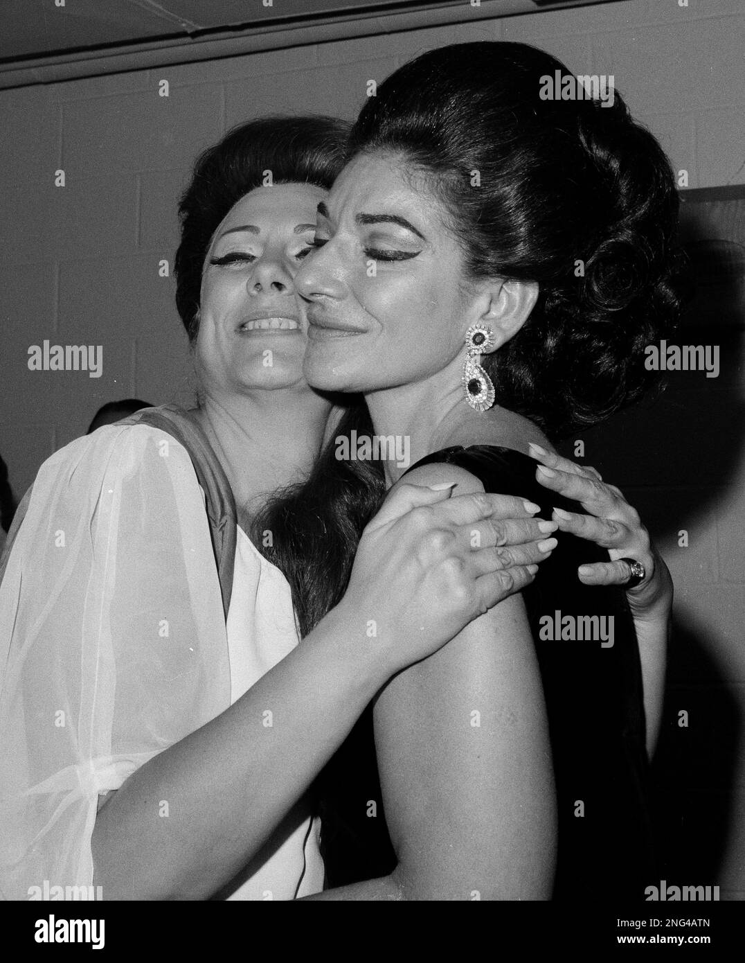 Opera soprano Maria Callas is embraced by Renata Tebaldi at the ...