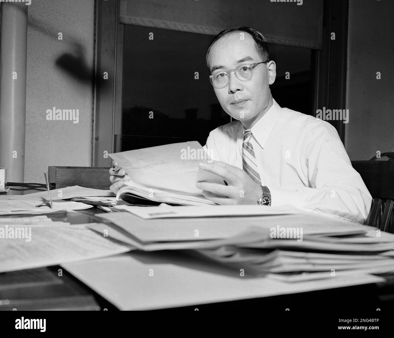 Dr. Hideki Yukawa of Kyoto University, seen in his office Oct. 19, 1949 ...