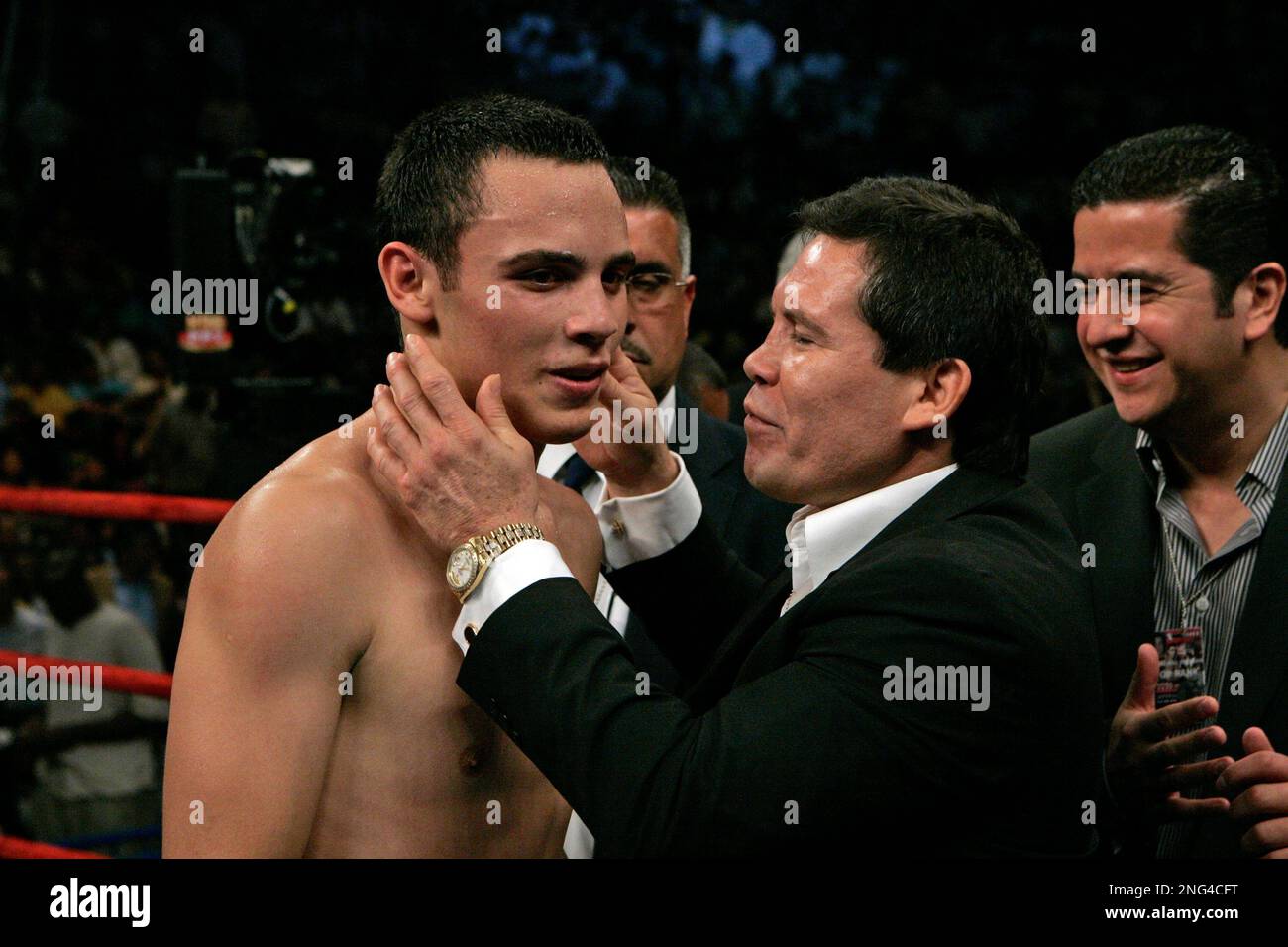 Julio Cesar Chavez Sr., right, congratulates his son Julio Jr. after ...