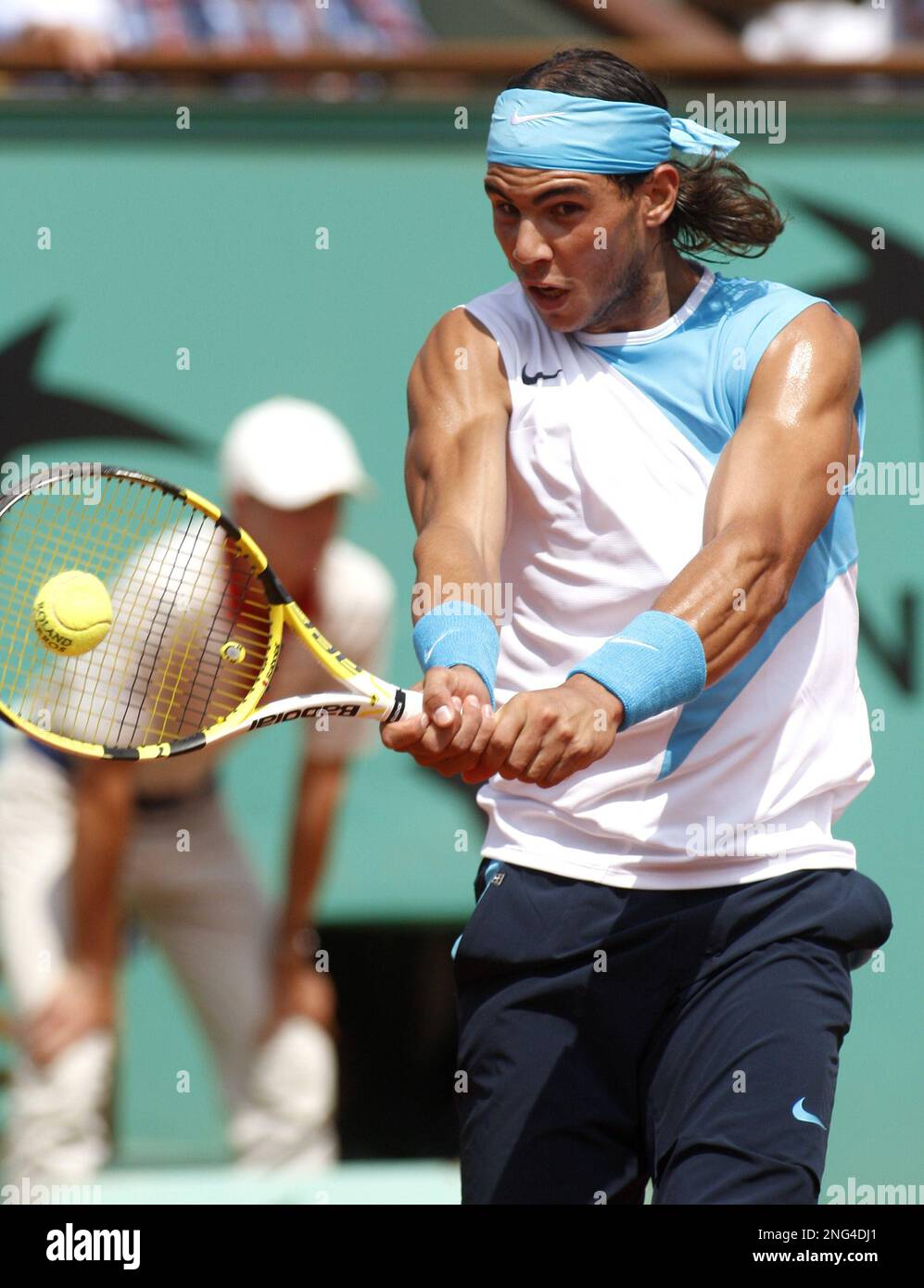 Spain's Rafael Nadal backhands to Switzerland's Roger Federer during ...