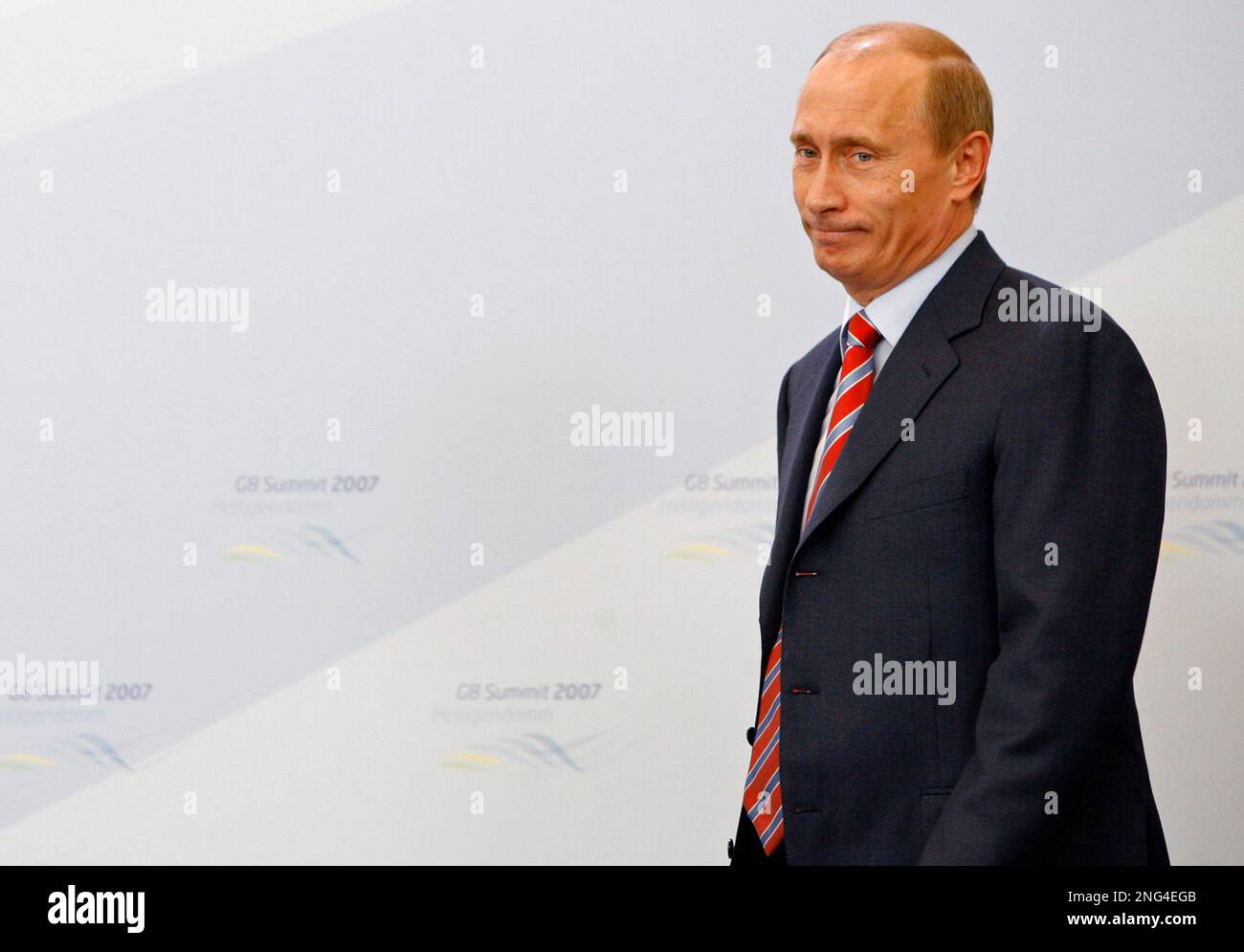Russian President Vladimir Putin arrives for a press conference at the ...
