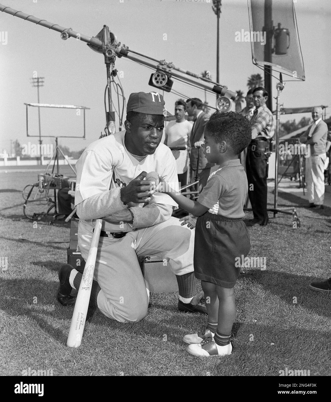 Jackie Robinson talks to his son, Jackie Robinson Jr., during a scene ...