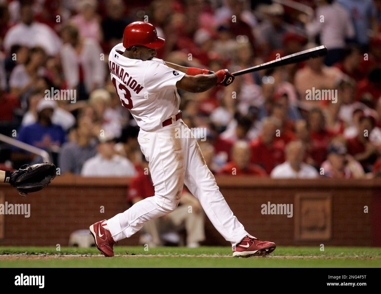St. Louis Cardinals' Juan Encarnacion hits a home run during a baseball ...
