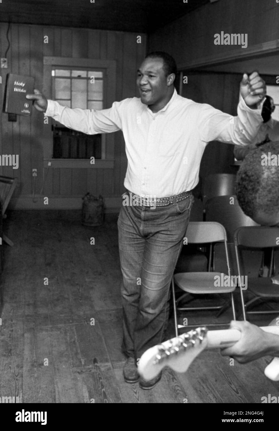 Former heavyweight champion George Foreman who is now a preacher ...