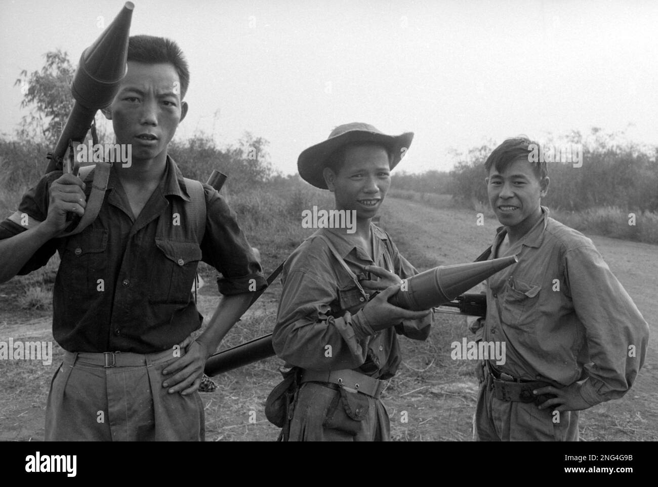 Viet Cong soldiers are seen carrying B-40 anti-tank rockets in Binh ...