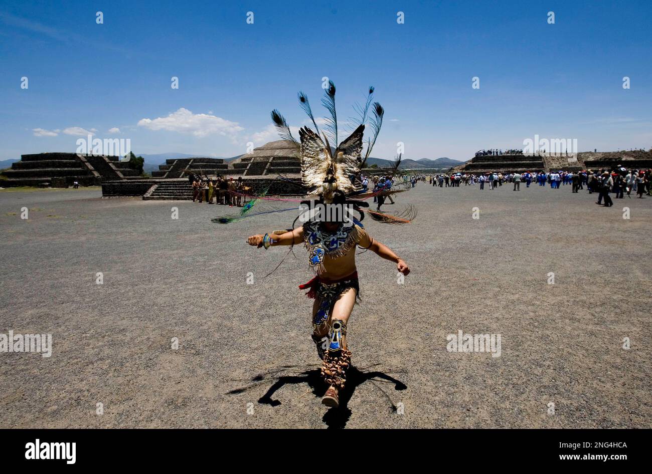 An actor in Aztec dress dances at a ceremony marking the arrival of the ...