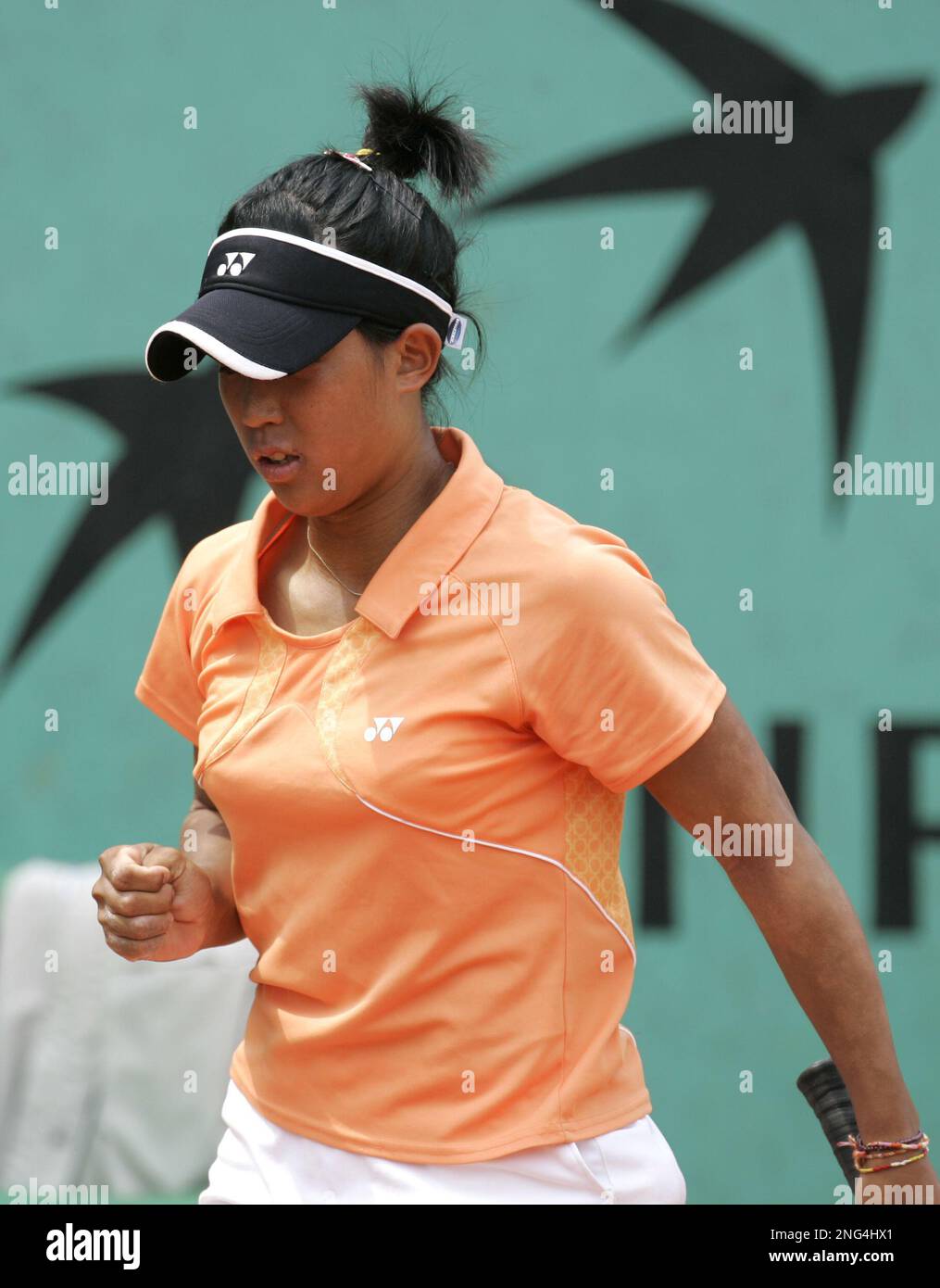 Japan's Shiho Akita reacts as she plays France's Adeline Goncalves ...
