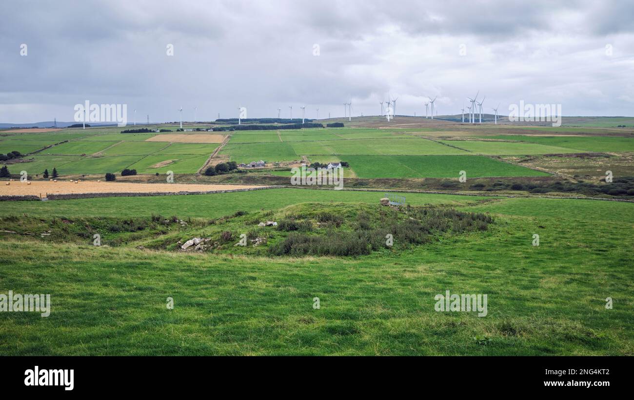 Brimside Tulloch broch and Stemster Hill Wind Farm Stock Photo - Alamy