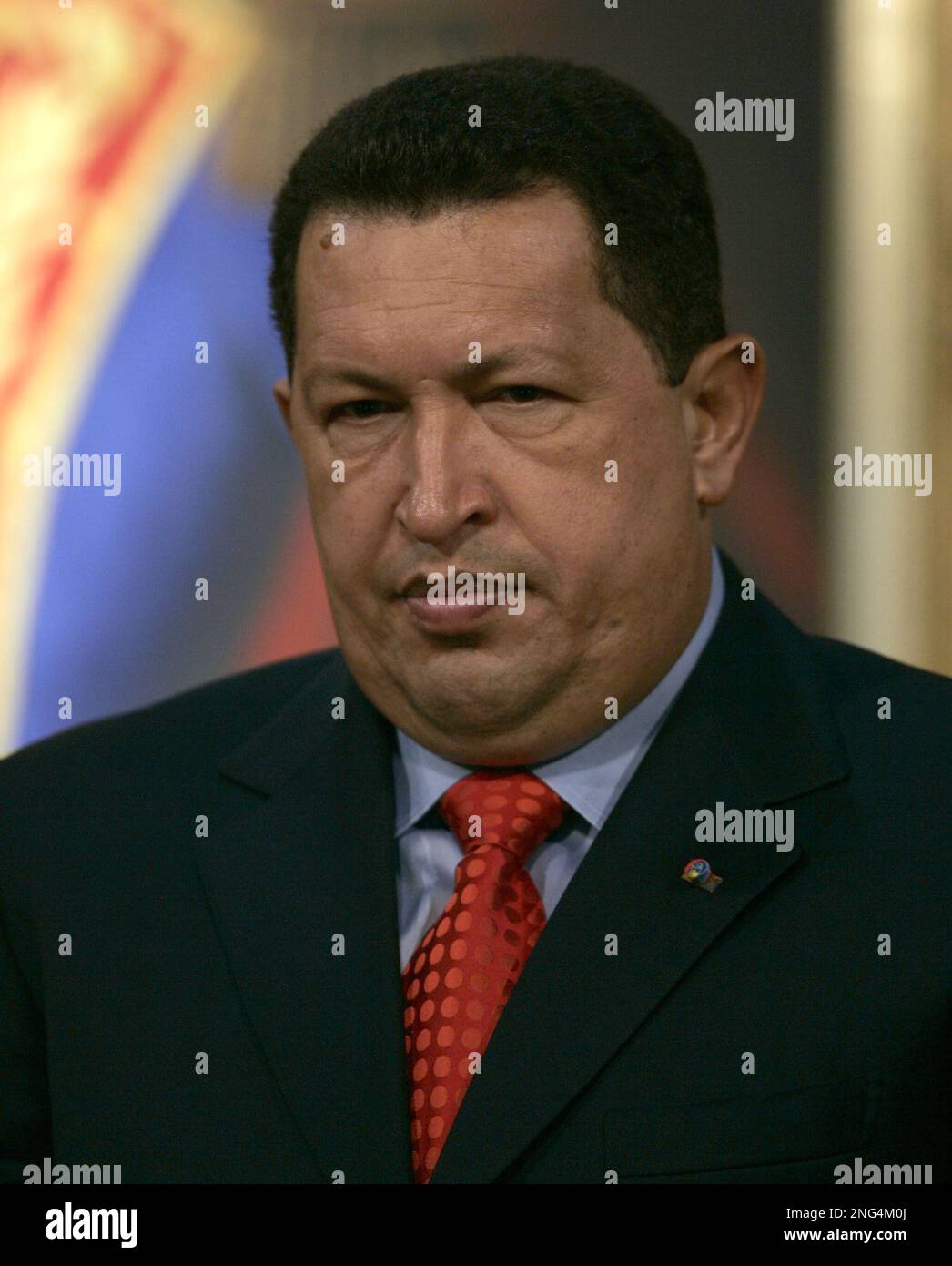 Venezuela's President Hugo Chavez listens to Vietnam's Communist Party ...