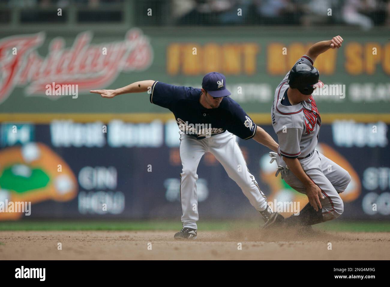 Milwaukee Brewers shortstop J.J. Hardy tags out Atlanta Braves' Kelly ...