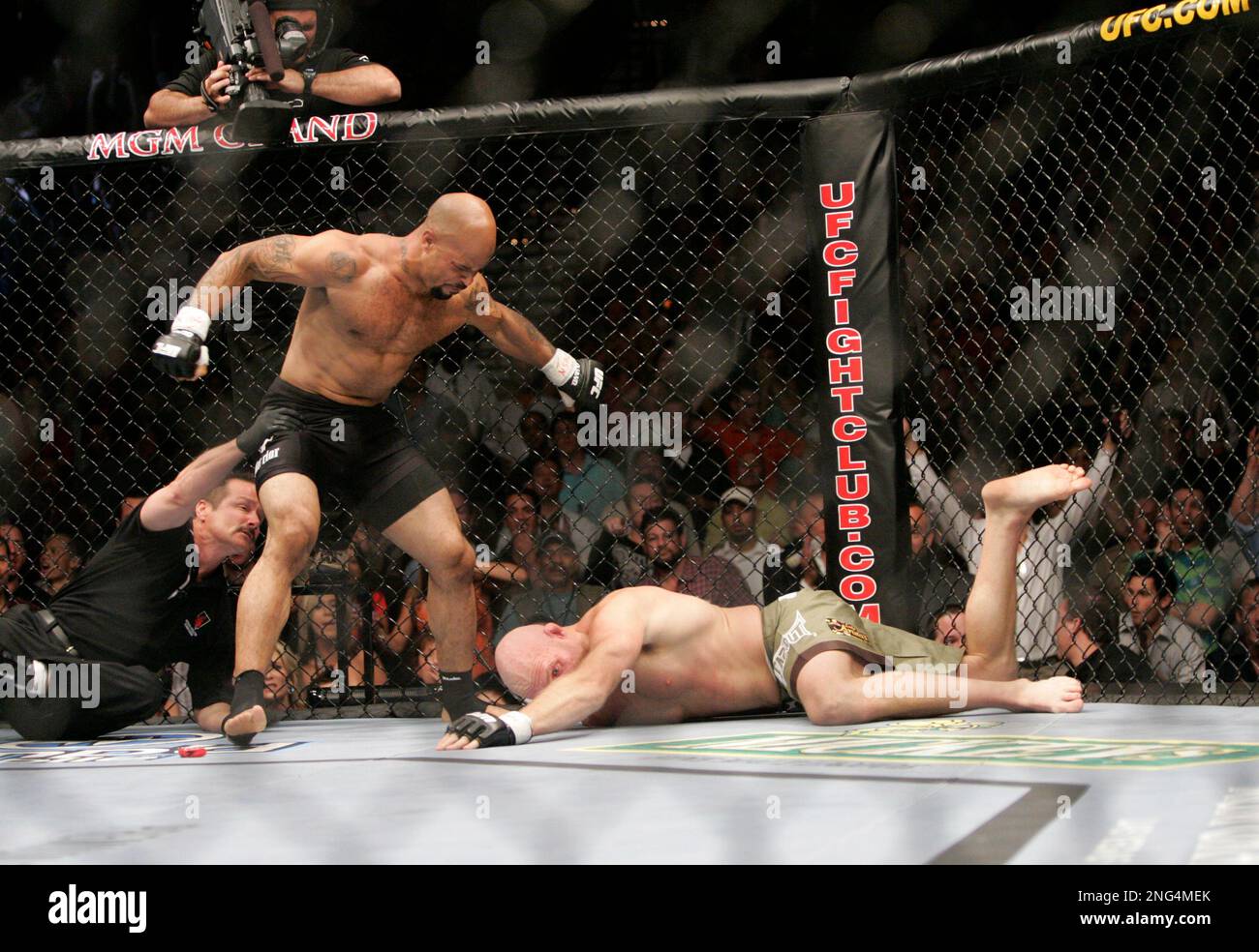 Houston Alexander is pulled off a prone Keith Jardine by referee Steve ...