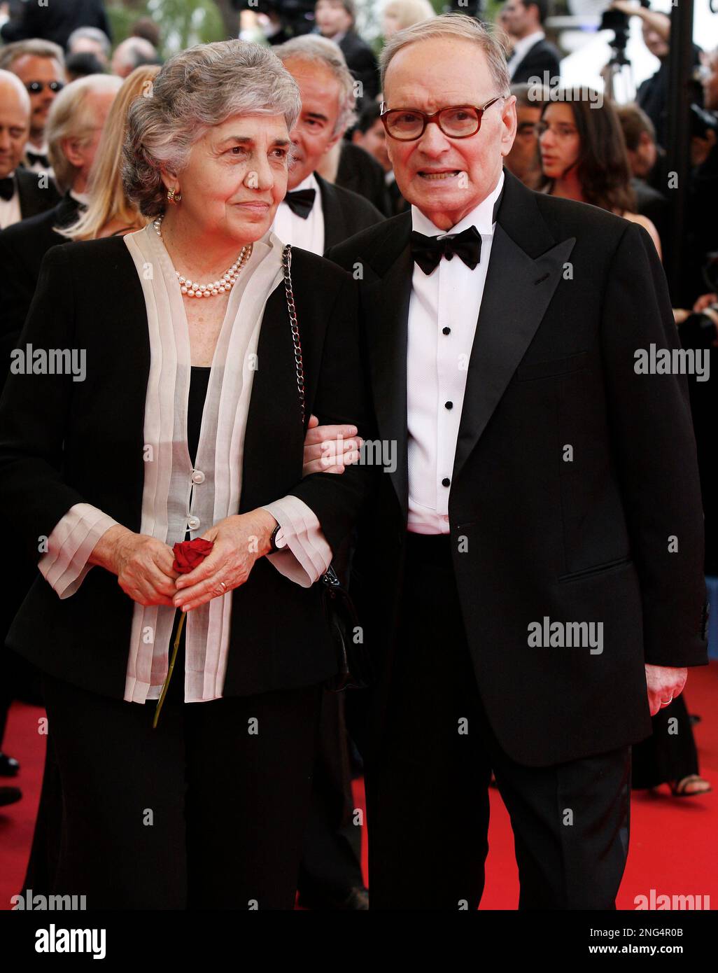 Italian composer Ennio Morricone and his wife Maria Travia arrive for ...
