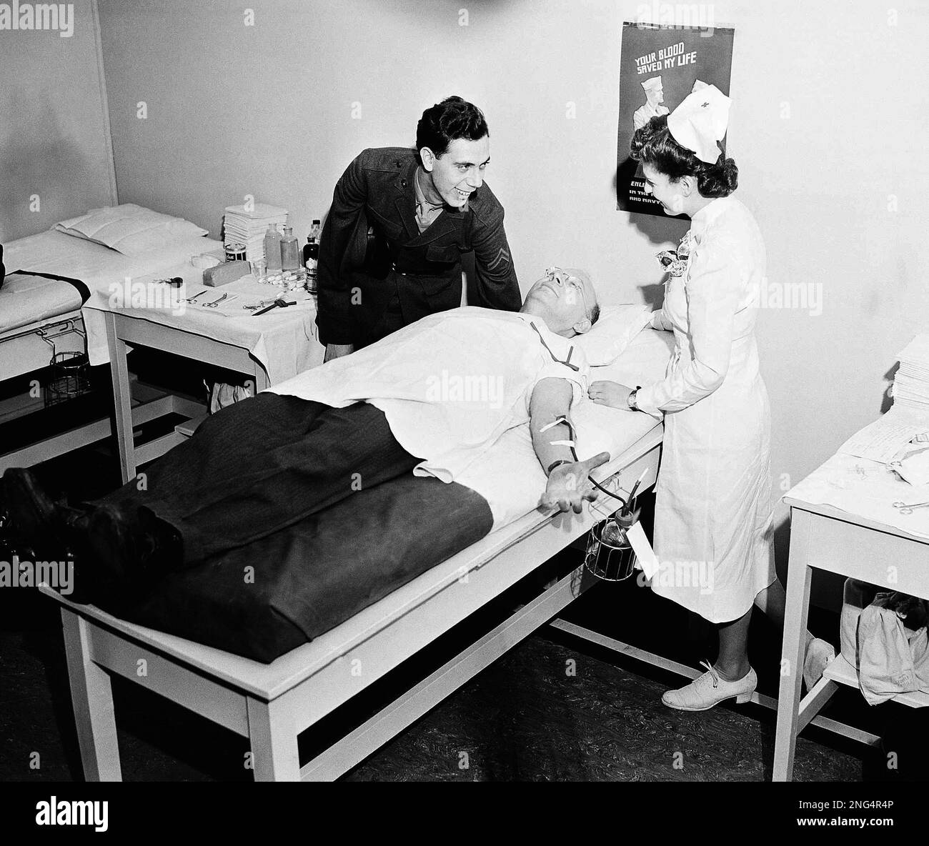 Frank A. Sileo gives a pint of his blood to repay for the blood given ...