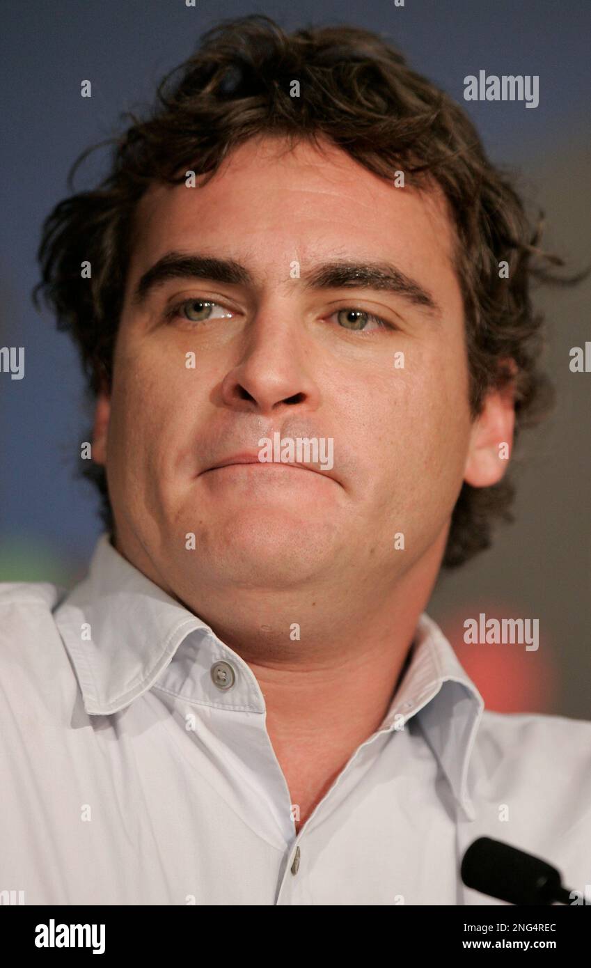 American actor Joaquin Phoenix listens during a press conference for ...