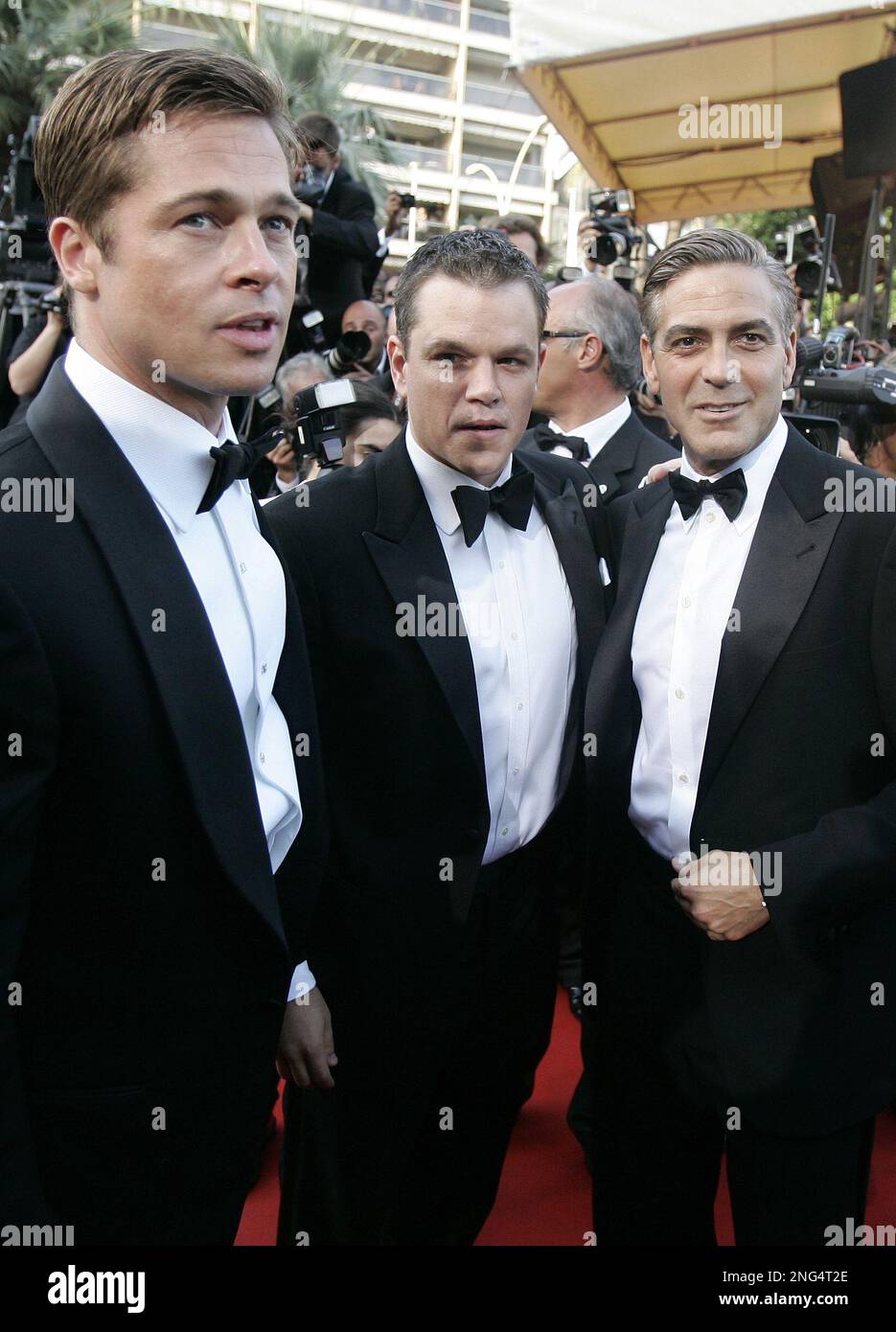From left, American actors Brad Pitt, Matt Damon, and George Clooney ...