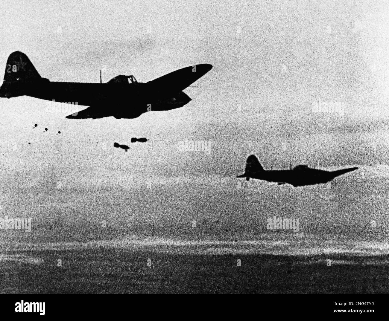Bombs fall from a Russian plane blasting at German positions in the ...