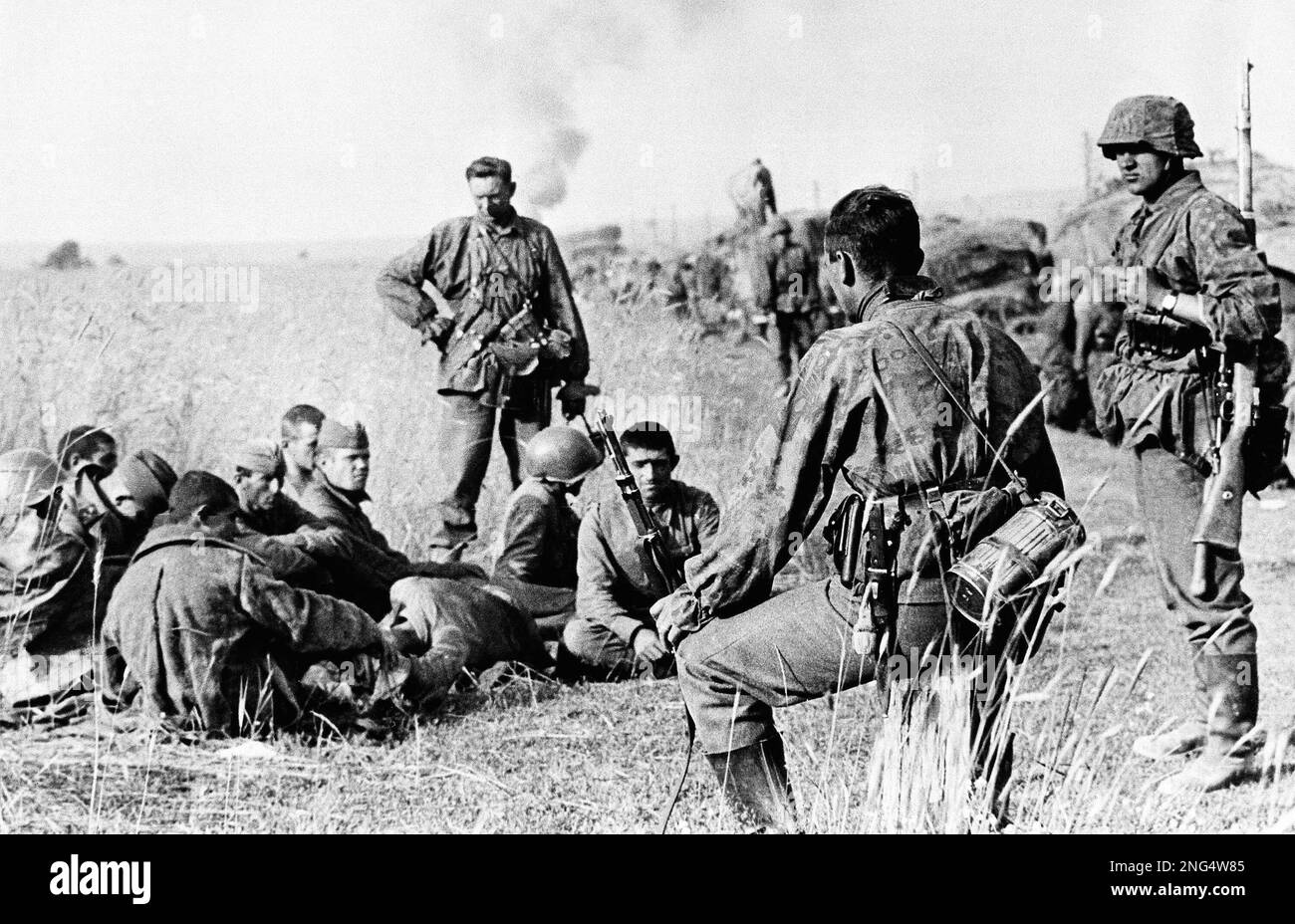 German soldiers stand guard over what Berlin sources described as ...