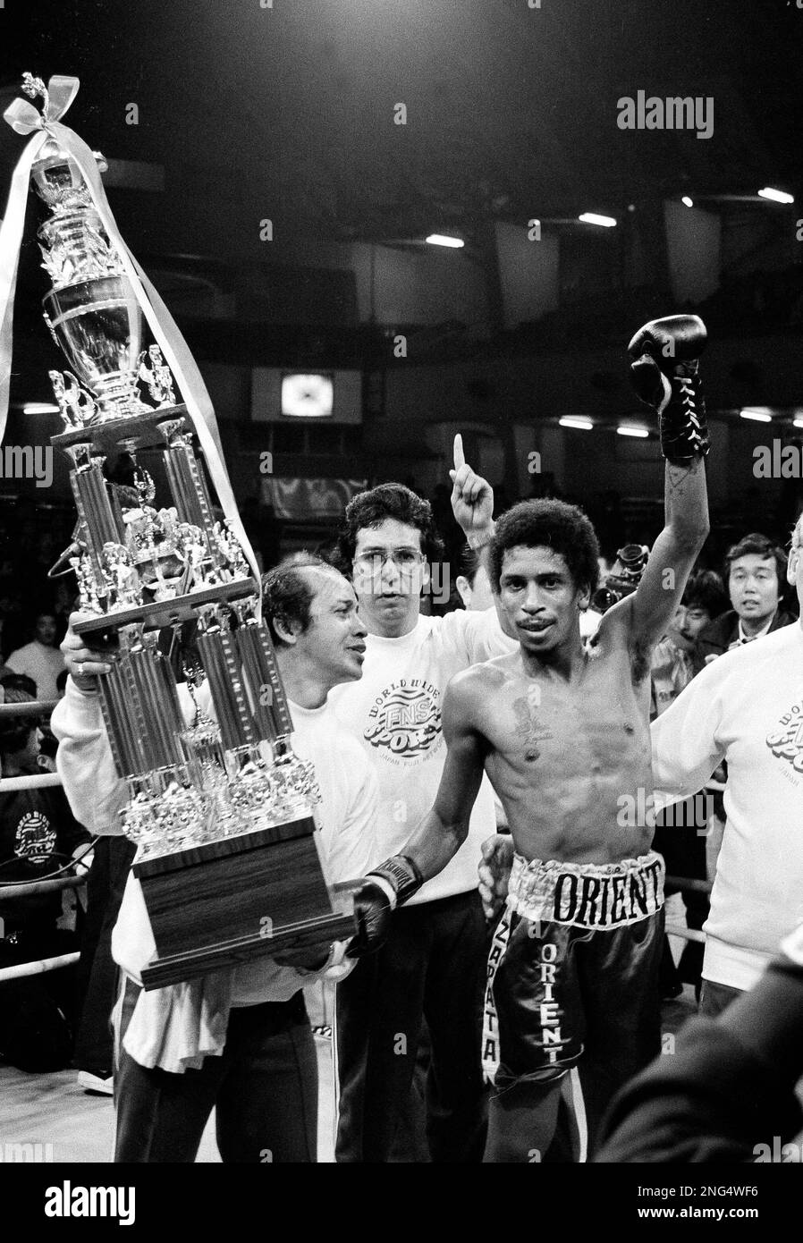 Panamanian boxer Hilario Zapata celebrates with his trainers after his ...