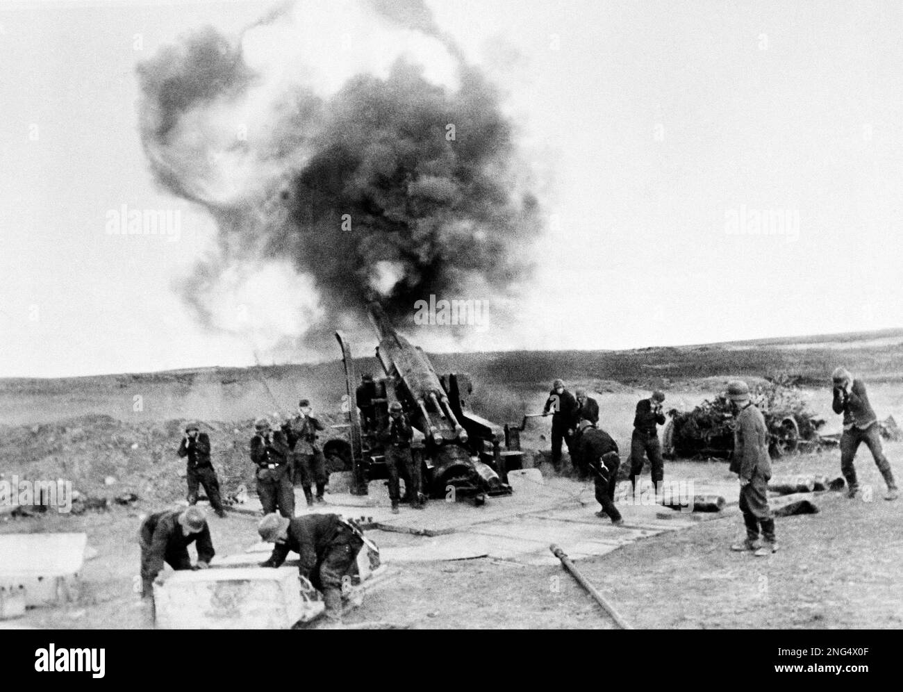 A German gun blasting away at a Russian position October 31, 1941 ...
