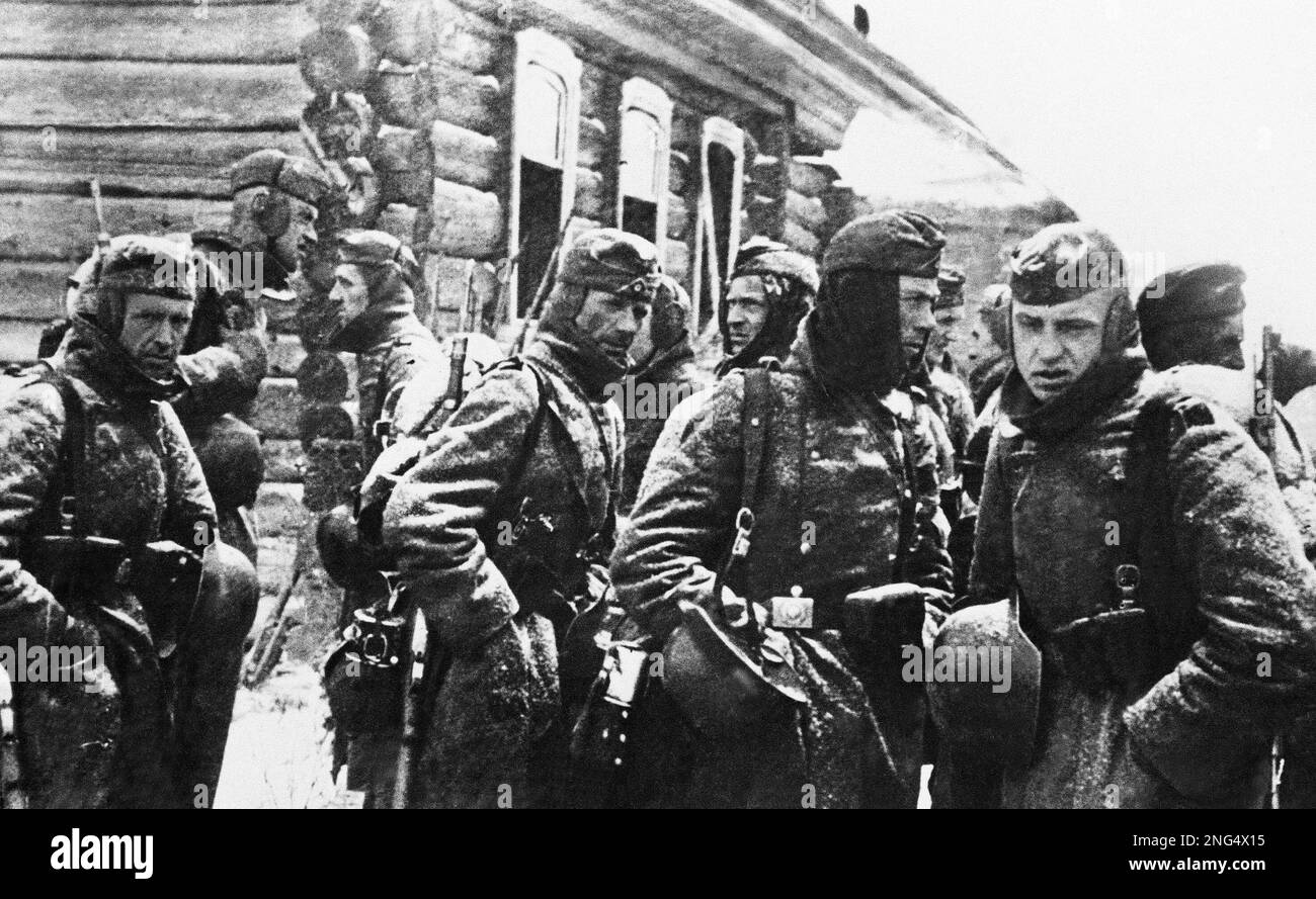 German soldiers bundle themselves in all available clothes as they try ...