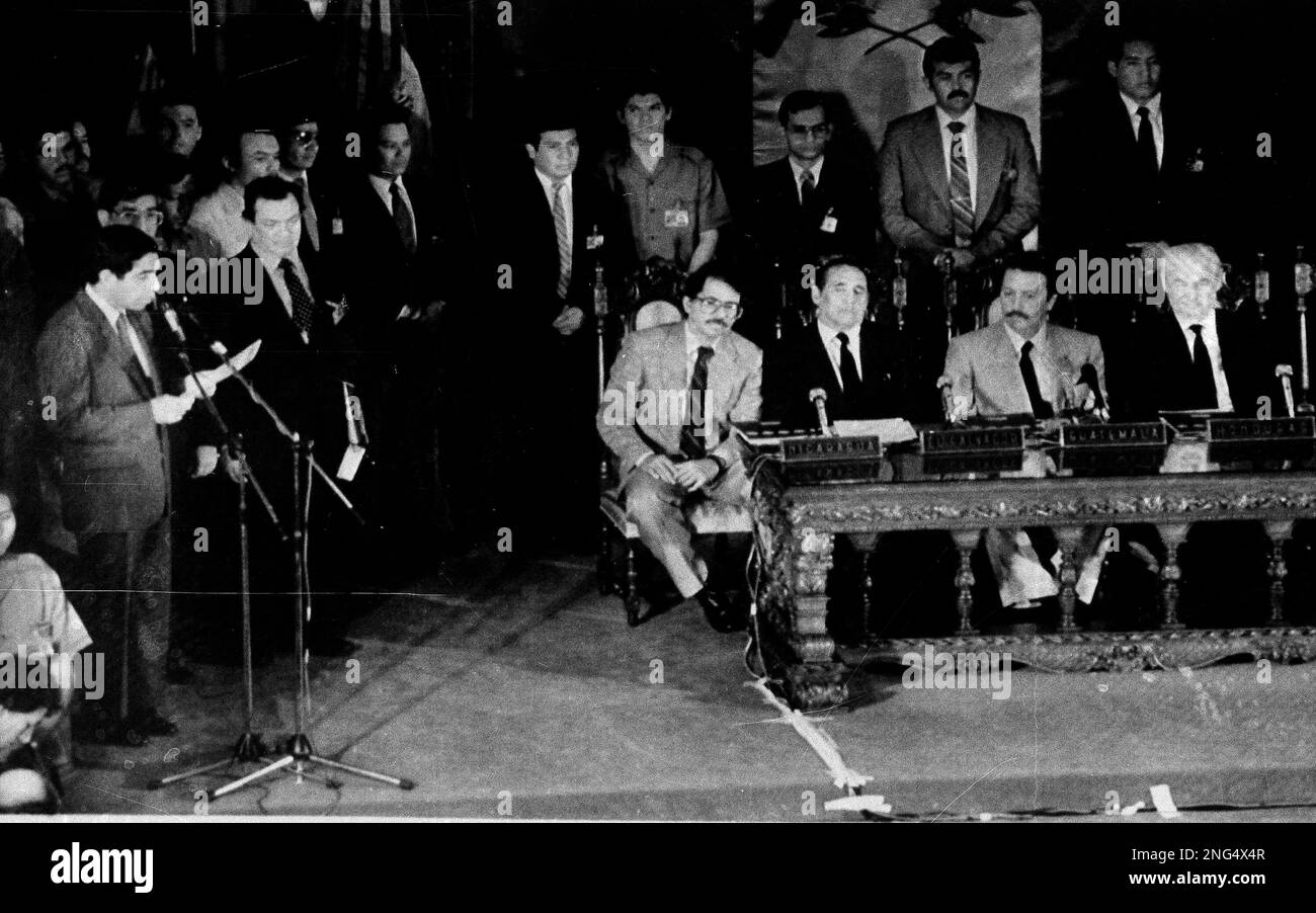 President Oscar Arias of Costa Rica reads a peace agreement signed by the five Central American ...