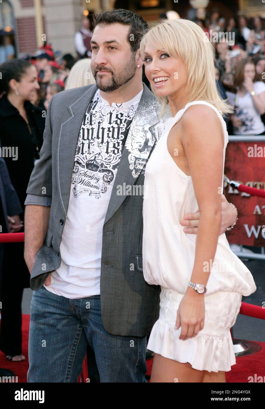 Joey Fatone, left, and Kym Johnson arrive at the premiere for "Pirates ...