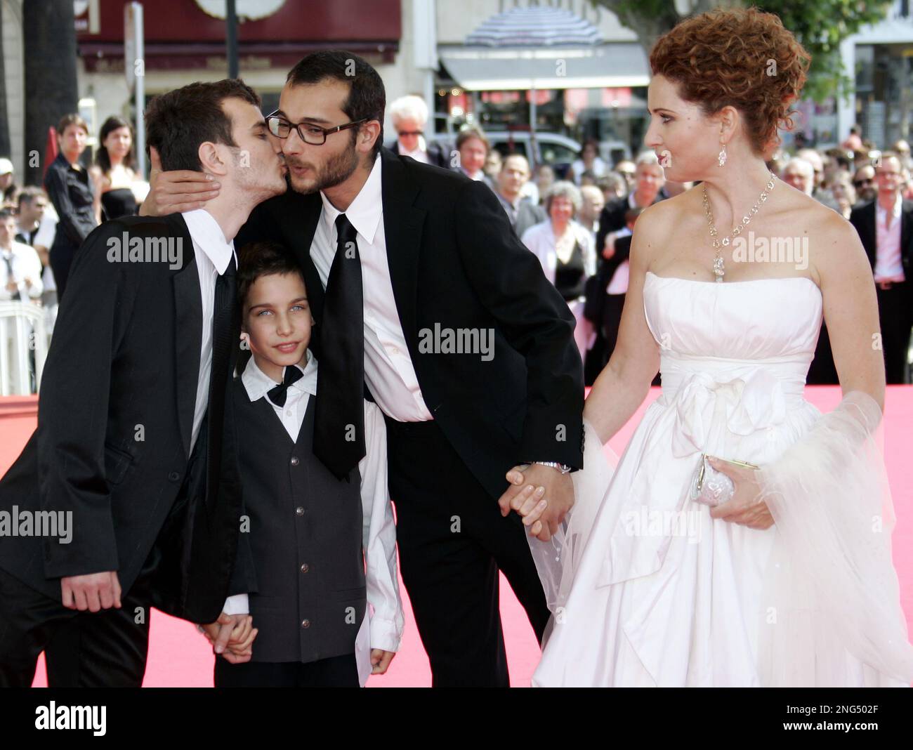 French Director Raphael Nadjari, center, hugs cast member Michael ...