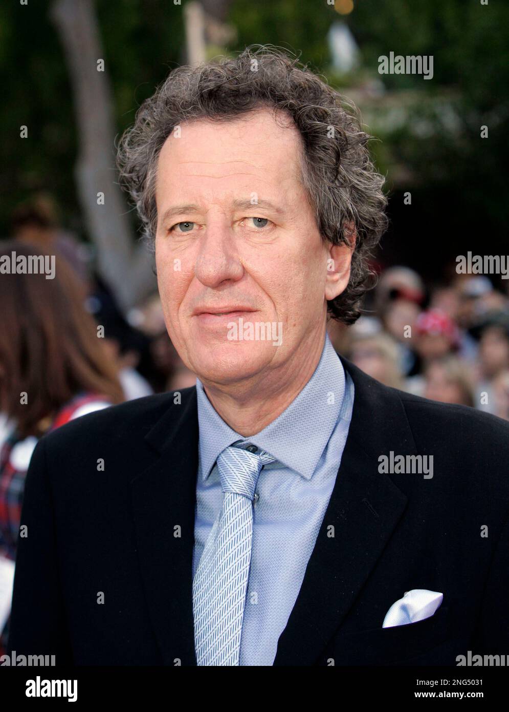 Actor Geoffrey Rush poses for photographers at the film premiere of ...