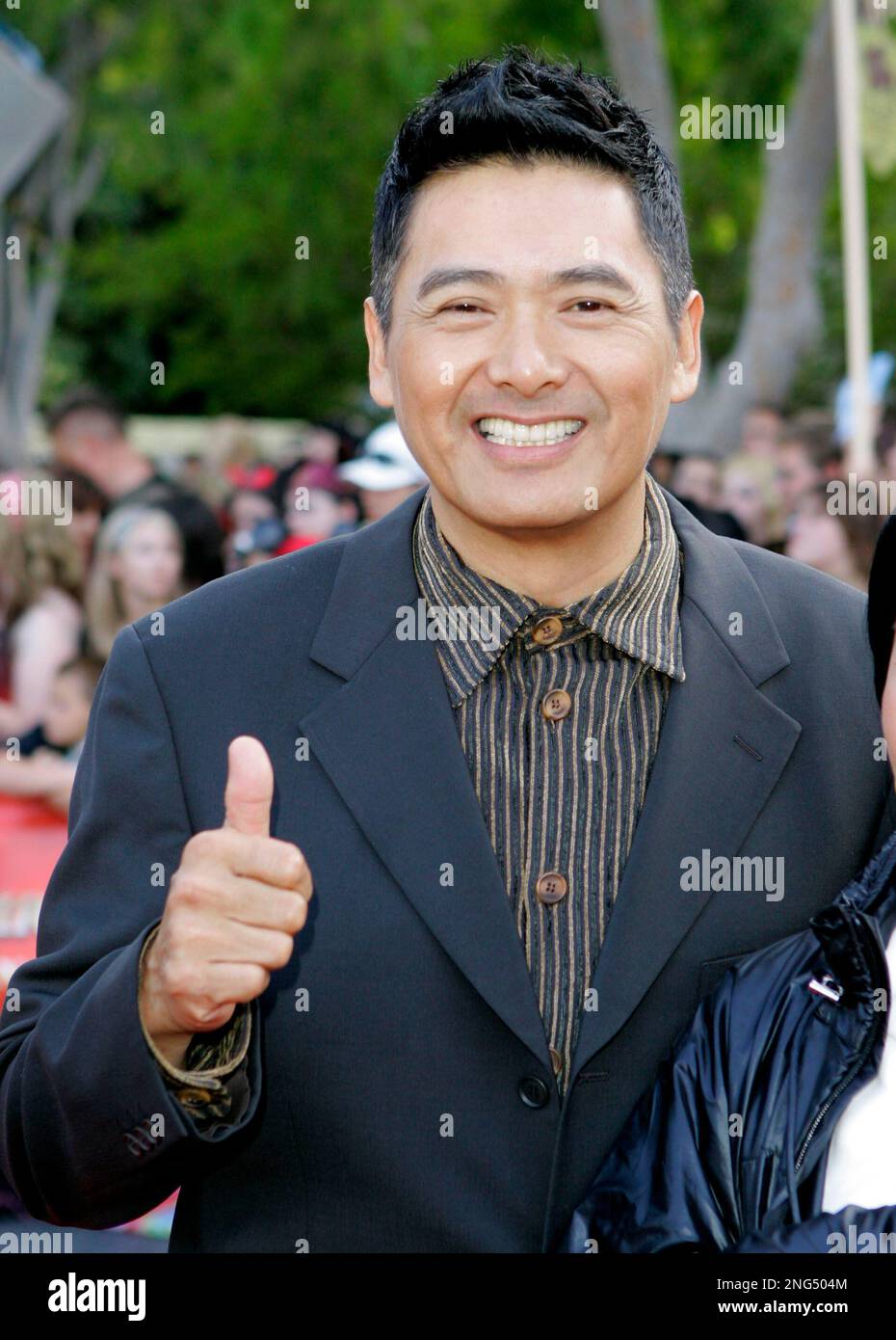 Actor Chow Yun-Fat poses for photographers at the film premiere of ...