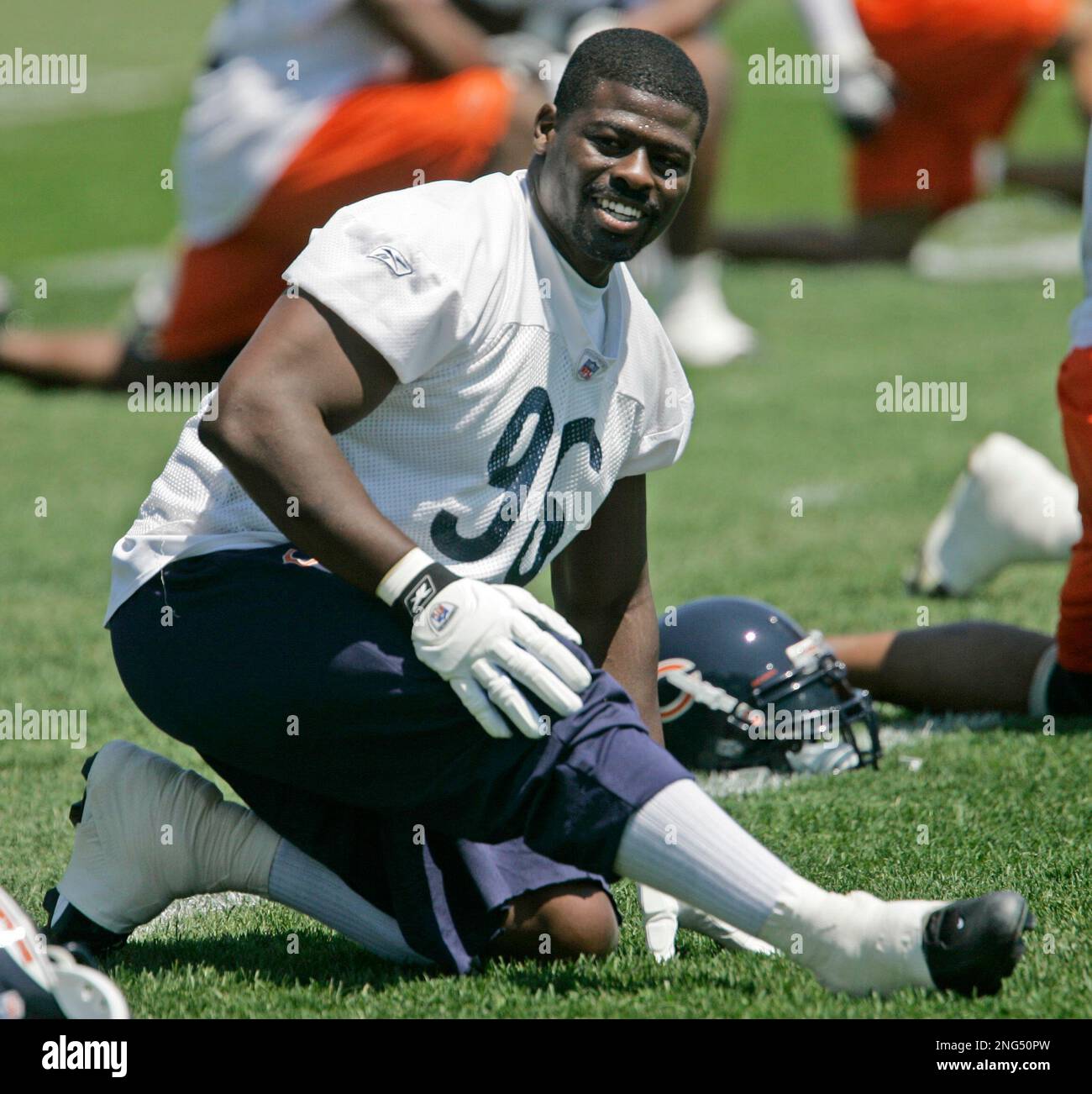 Chicago Bears' Alex Brown stretches before practice during football ...