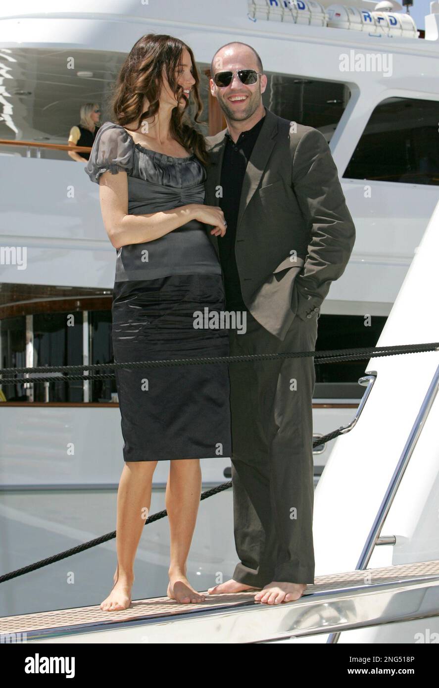 British actors Saffron Burrows, left, and Jason Statham pose during a ...