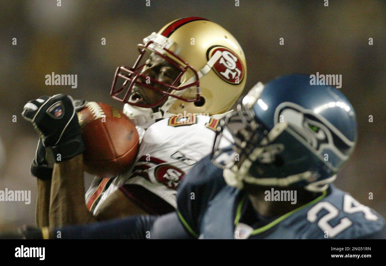 San Francisco 49ers' Terrell Owens catches the game-winning touchdown ...