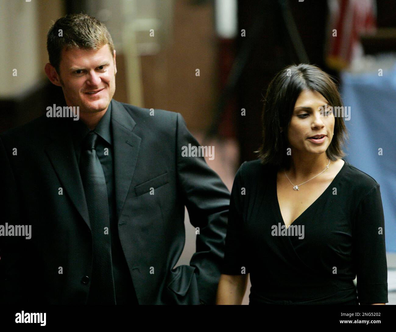 Cyclist Floyd Landis, left, and his wife Amber, attend his arbitration ...