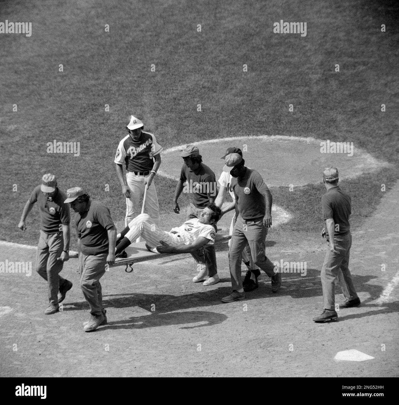 New York Met's outfielder George Theodore is carried off the field ...