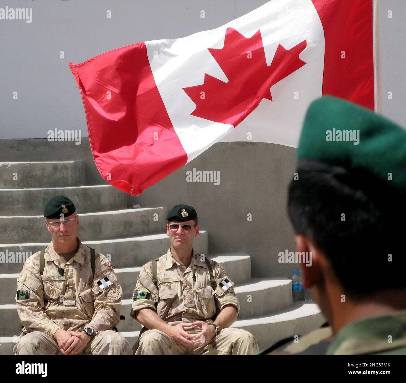 Brig.-Gen. Tim Grant, left, the commander of Canadian forces in ...