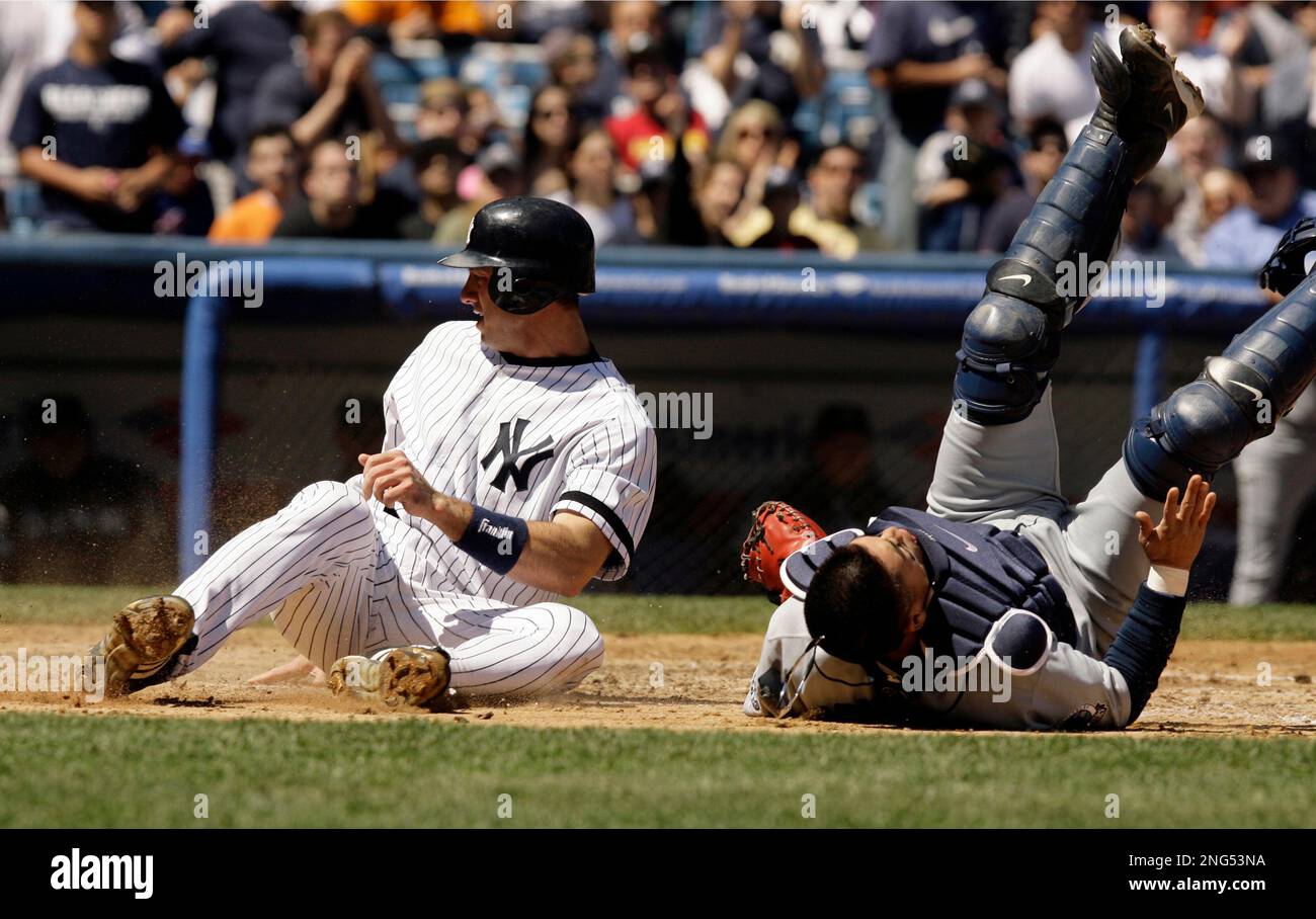 New York Yankees infielder Josh Phelps barrels into Seattle Mariners ...