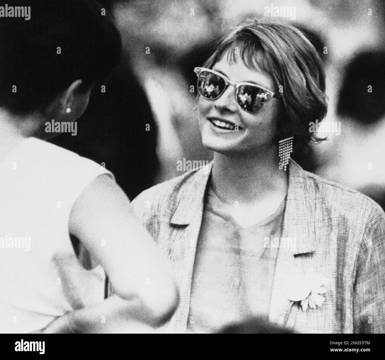 Actress Jodie Foster, right, talks with an unidentified woman at ...