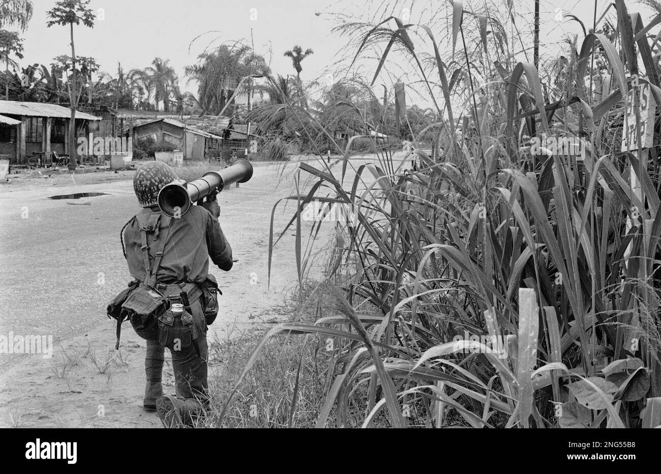 A federal Nigerian soldier holding an anti-tank bazooka is seen ...