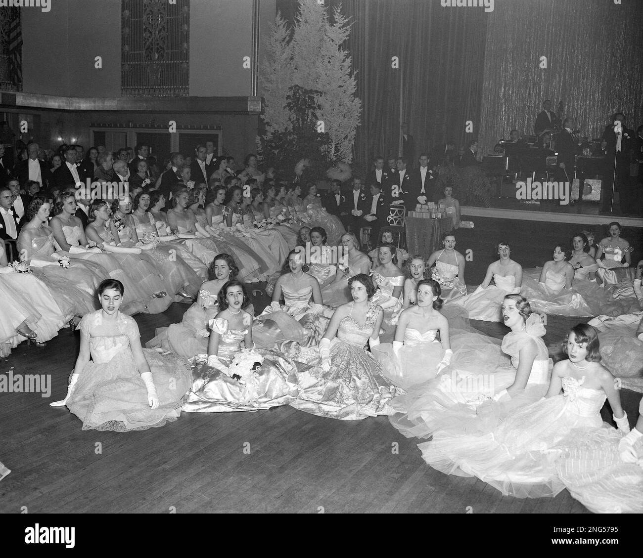 One hundred twenty debutantes dressed in white, or silver, made their ...