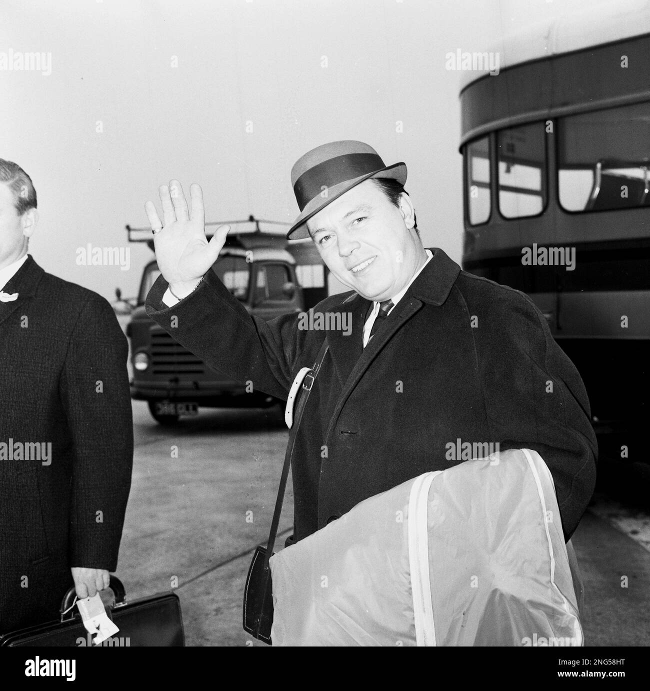 British singer Matt Monro is seen at London airport enroute to ...